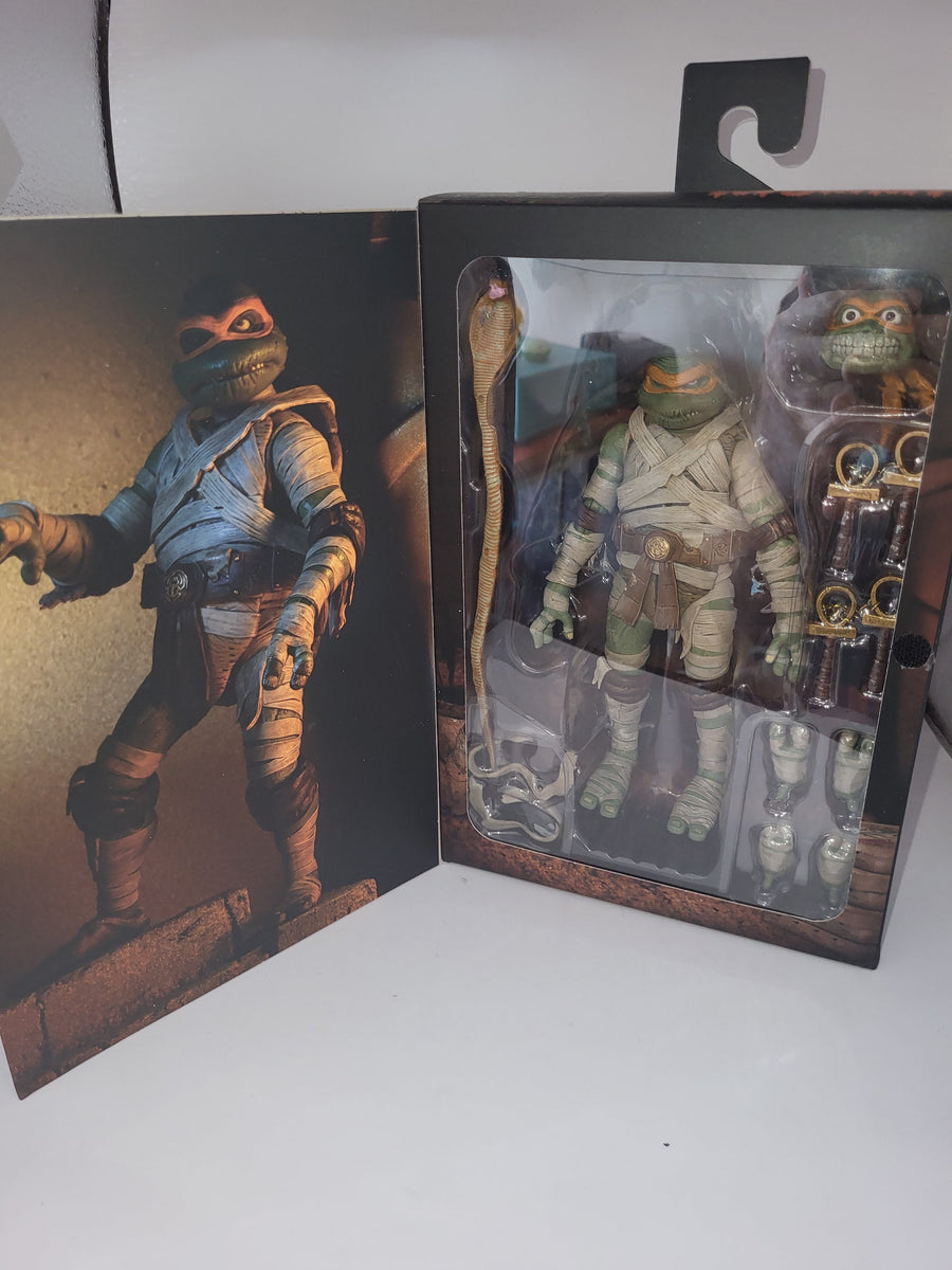 NECA TMNT X Universal Monsters- Michelangelo as the Mummy| Rogue Toys